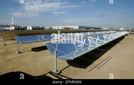 Newly installed solar panels seen on the roof of a bungalow, seen over ...