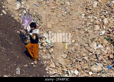 Indian rag picker girl Stock Photo - Alamy