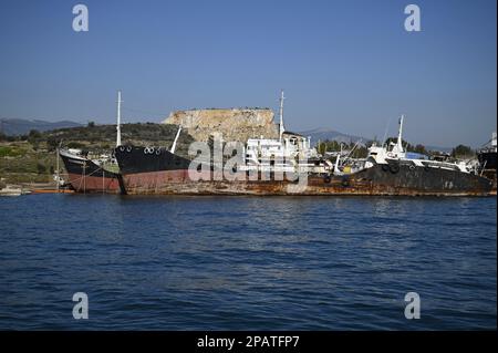 Landscape with various shipwrecks at the shallow Bay of Eleusis in ...