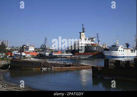 Landscape with various shipwrecks at the shallow Bay of Eleusis in ...