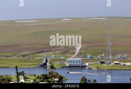 watering the crops in the florida everglades with irrigation trucks ...