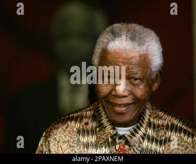 South Africa's President, Nelson Mandela, boards the Marine One to take ...