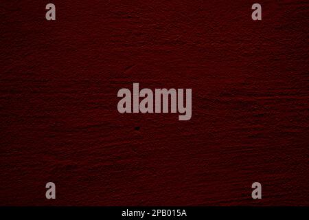Crimson red colored abstract wall background with textures of different ...