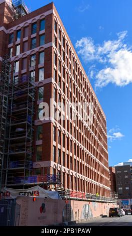 The Poplin apartment block under construction, March 2023. Oldham Road ...