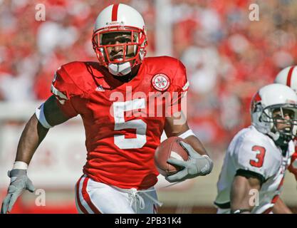 Nebraska's Marlon Lucky carries the ball on the first day of Nebraska's ...