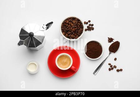 Flat lay composition with coffee grounds and roasted beans on black ...