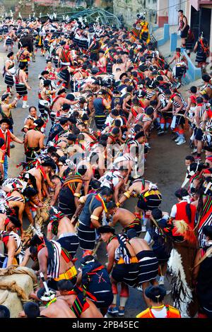 Group of Naga tribesmen in traditional dress, Kisima Nagaland Hornbill Festival, Kohima ...