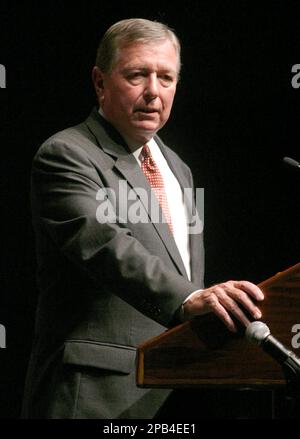 Former U.S. Attorney General John Ashcroft (L) watches as his wife ...