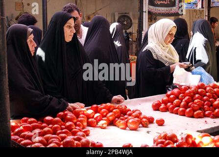 Iraqi women shop at the Dora market in southern Baghdad, Iraq, Sunday ...
