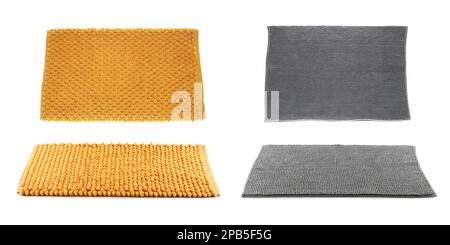 Set with soft bath mats on white background. Banner design Stock Photo ...