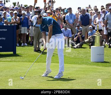 Min Woo Lee, of Australia, hits his tee shot on the 12th hole during a ...