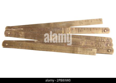 Antique carpenter's brass ruler from isolated on white background Stock ...