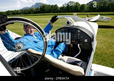 French handicaped pilot Philippe Carette gets in his plane, prior the ...