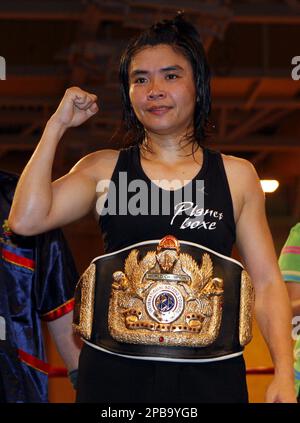 Chinese boxer Zhang Xi Yan, left, fights against German Pia Mazelanik, right, during a IWBC ...