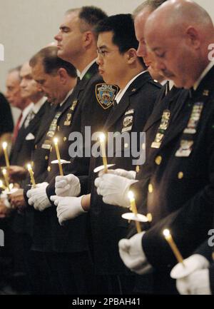 Police officer Herman Yan, partner of slain NYPD officer Russel ...