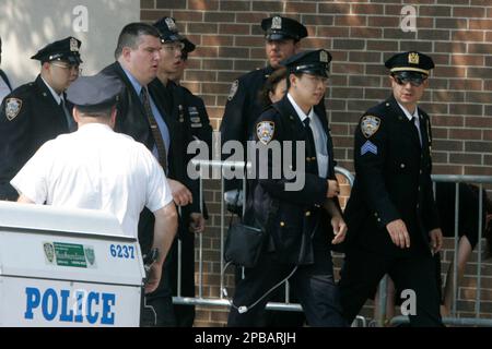 Police officer Herman Yan, partner of slain NYPD officer Russel ...
