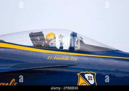 U.S. Navy Lt. Amanda Lee, a pilot for the Blue Angels, stands in front ...