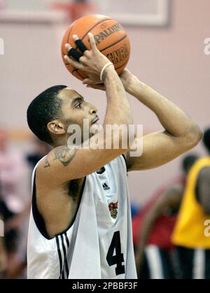 Atlanta Hawks rookie Acie Law IV answers questions during a press ...