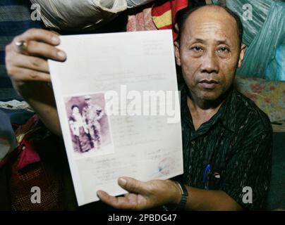 Vang Seng, a 57-year-old former Hmong battalion commander, shows ...