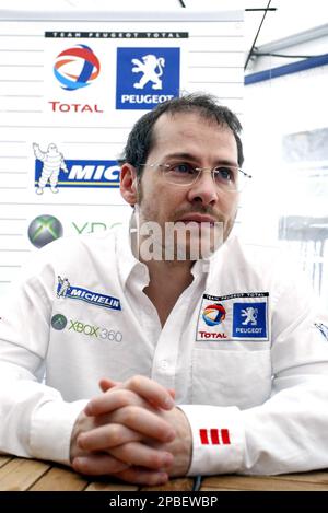 Former F1 world champion Jacques Villeneuve, with his son Gilles and ...