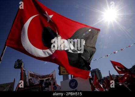 Pro-secular demonstrators wave a huge Turkish flag during a rally in ...