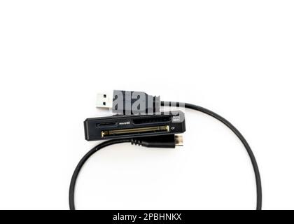 Multimedia card reader and SDHC card isolated on white background ...