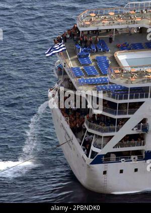 The listing cruise ship 'Sea Diamond' carrying nearly 1,200 passengers ...