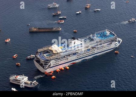 The listing cruise ship 'Sea Diamond' carrying nearly 1,200 passengers ...