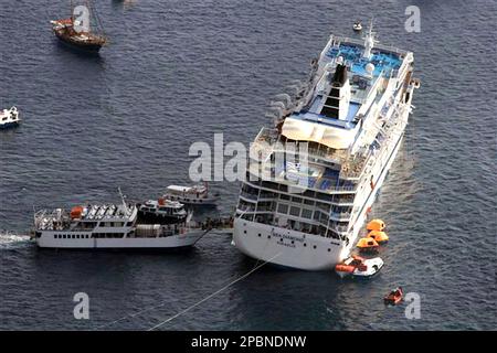The listing cruise ship 'Sea Diamond' carrying nearly 1,200 passengers ...
