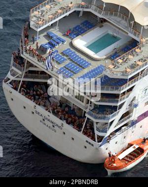 The listing cruise ship 'Sea Diamond' carrying nearly 1,200 passengers ...