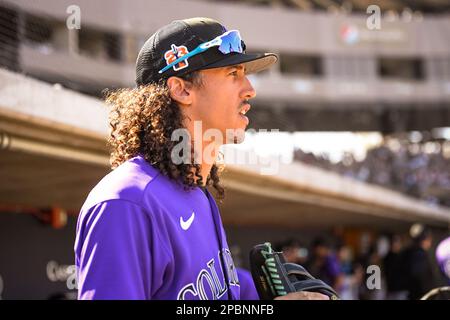 Colorado Rockies center fielder Cole Carrigg catches a fly ball hit by ...