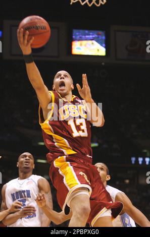 North Carolina's Reyshawn Terry, left, rebounds after Murray State's ...