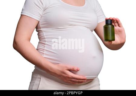 Body oil for pregnant woman, studio shot on white background Stock ...