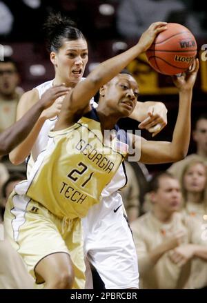 Georgia Tech's Janie Mitchell (21) has her shot blocked by Miami's ...
