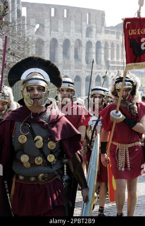 People wearing Roman Centurion costumes prepare to take part in a ...