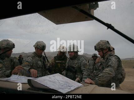 U.S. Maj. Gen. Stephen Layfield, left, deputy commander for Security of ...