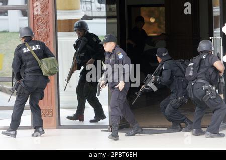 SWAT members of the Philippine National Police undergo a refresher ...