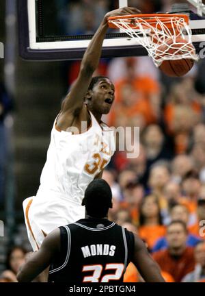 Oklahoma State forward David Monds (32) grabs a rebound as Texas ...