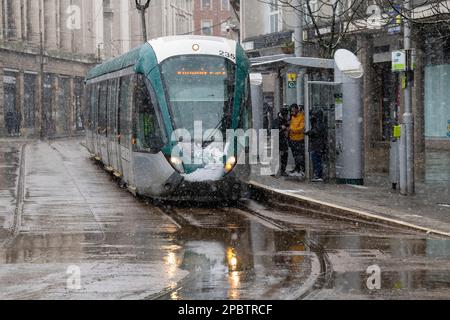 Snow covered tram in the Market Square, Nottingham Nottinghamshire ...