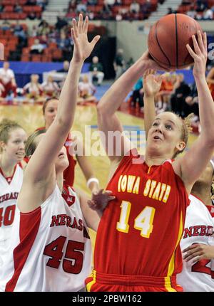 Iowa guard Lyndsey Medders, right, and guard Megan Ronhovde, left ...