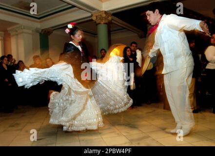 Dancers with Ballet Folklorico, from left, Gina Guzman, Eric Rodriguez ...