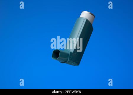Asthma inhaler, generic, non-branded. Close up studio shot, isolated on ...