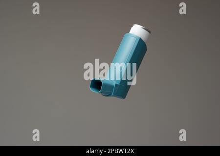 Asthma inhaler, generic, non-branded. Close up studio shot, isolated on ...