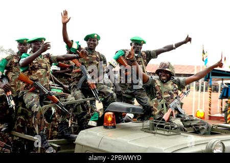 Ugandan soldiers of the Uganda People's Defence Force (UPDF) patrol ...