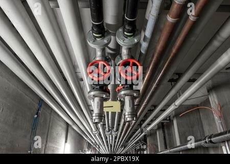 Ceiling mounted industrial pipelines and science laboratory machinery ...