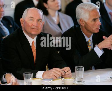 Georgia Gov, Sonny Perdue, left, and Capt. Brian McIlvaine, the ...