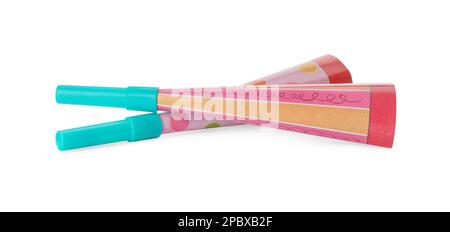 Bright party blowers on white background. Festive items Stock Photo - Alamy