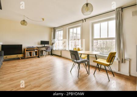 Spacious dining room and workplace Stock Photo - Alamy