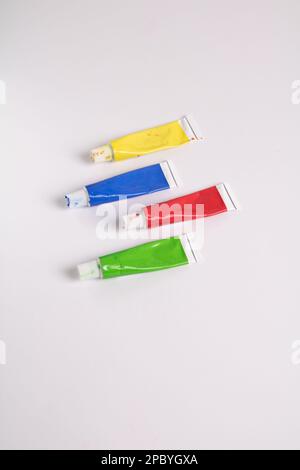 paint in tubes isolated on white Stock Photo - Alamy