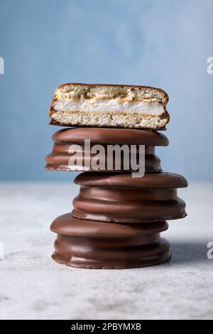Tasty choco pies on grey table. Snack cakes Stock Photo - Alamy